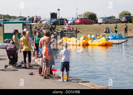 families having fun at The Oyster Pond boating lake Littlehampton Stock ...
