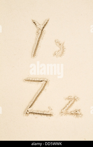 alphabet in sand Stock Photo - Alamy