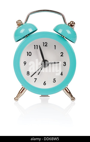 black vintage alarm clock on the black background Stock Photo - Alamy