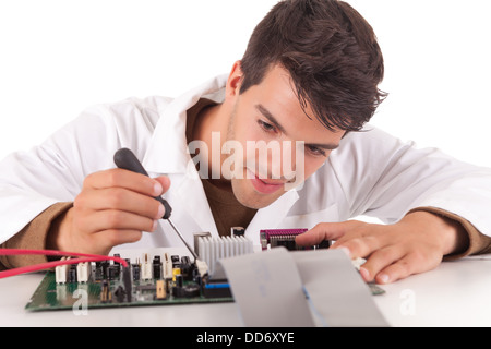 Happy and successful young computer engineer Stock Photo - Alamy