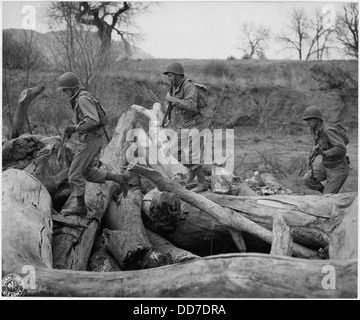 Commando training exercises at Camp Carson, Colorado, are shown ...