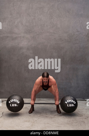The Weight Lifter Stock Photo - Alamy