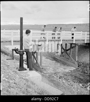 A group of residents at the Heart Mountain Relocation Center in Wyoming ...