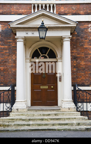 Traditional Georgian house with pediment over the front door and ...