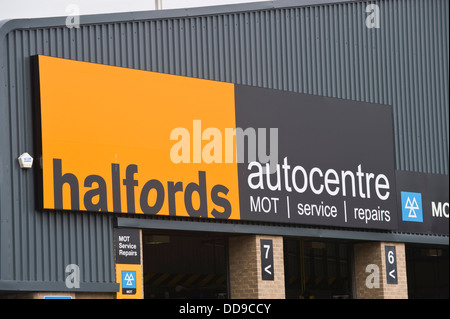 Halfords AutoCentre sign Stock Photo - Alamy