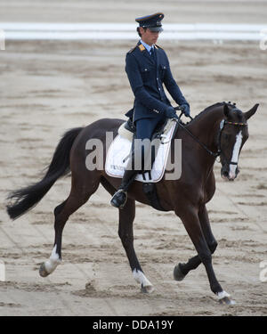 Malmo, Sweden. 29th Aug, 2013. German equestrian Benjamin Winter smiles ...