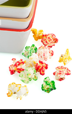 Ceramic bowls with tasty popcorn on color background Stock Photo - Alamy