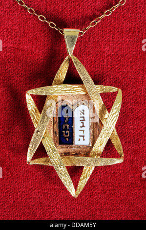 Two star necklaces on white background Stock Photo - Alamy