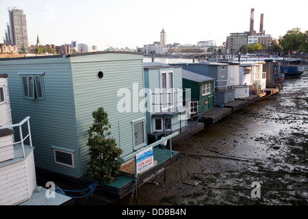 Houseboats on the River Thames in Bermondsey, near Tower Bridge London ...