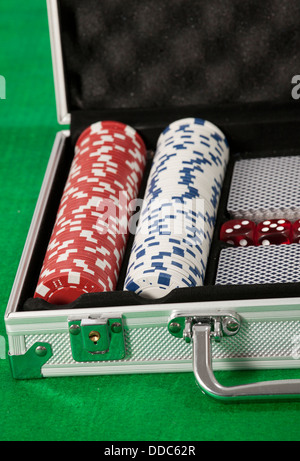 poker chips and cards in a briefcase Stock Photo - Alamy