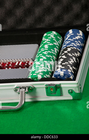 poker chips and cards in a briefcase Stock Photo - Alamy