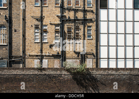 Old fashioned plumbing in London with all pipes exterior to the ...