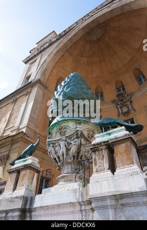 Ancient bronze Pigna, or pine cone, statue in the Vatican courtyard in ...