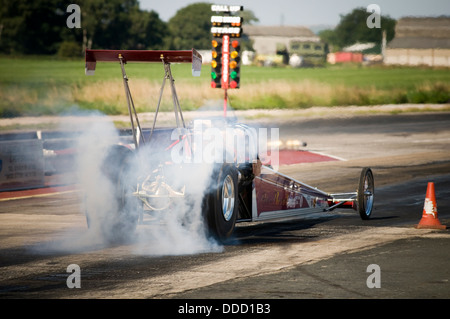 dragster dragsters burnout burning out smoke the tires spinning its ...
