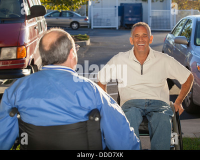 Man with Friedreich's Ataxia greeting his friends with spinal cord ...