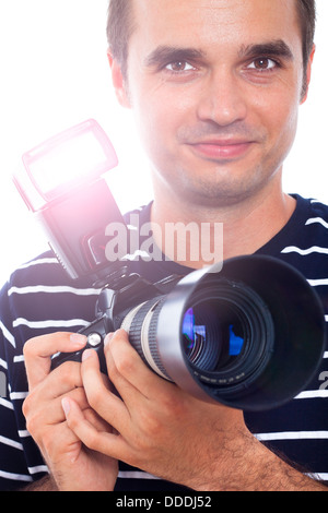 portrait of young man photographer in the mountain forest looking on ...