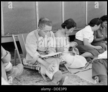 This photograph depicts families of Japanese ancestry arriving at the ...