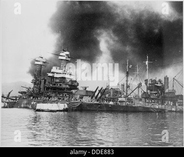 A naval photograph documenting the Japanese attack on Pearl Harbor ...