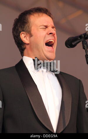 Baritone, Grant Doyle performs at The Darley Park classical music outdoor concert, Derby ...