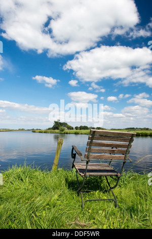 Landscape with Dutch river the Eem and empty chair Stock Photo - Alamy