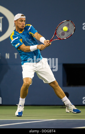 Lleyton Hewitt (AUS) competing at the 2013 US Open Tennis Championships ...