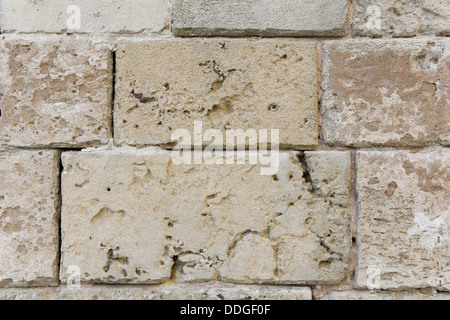Close-up view of a weathered stone carving showing intricate geometric ...