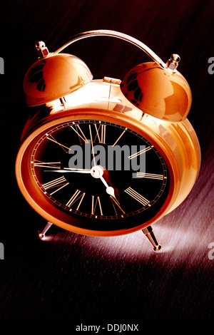 Clock with clock on black background Stock Photo - Alamy