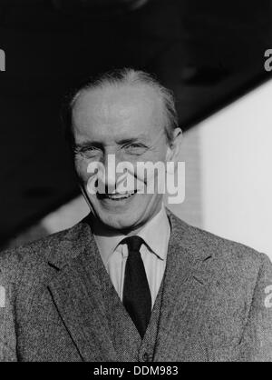 Sir Alexander Arnold Constantine Issigonis CBE FRS RDI stands with his ...