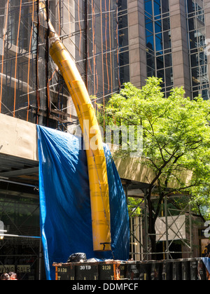 Debris Gravity Chute at Building Construction Site Stock Photo - Alamy
