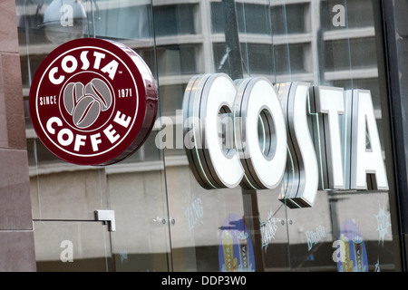 Costa coffee signs and shop on motorway service station and car park ...