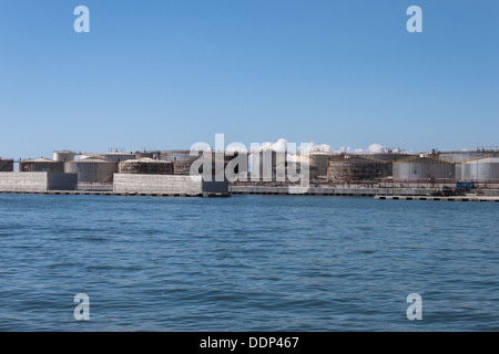 Huge cisterns in the port of Genoa, Italy Stock Photo - Alamy