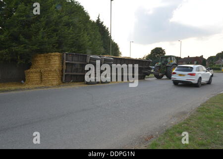 Horley, Surrey, UK. 5th September 2013. Hay Bale trailer overturned at ...