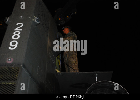 Staff Sgt. Ernie Botello, a CH-47 Chinook helicopter flight engineer ...