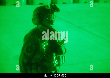 Staff Sgt. Ernie Botello, a CH-47 Chinook helicopter flight engineer ...