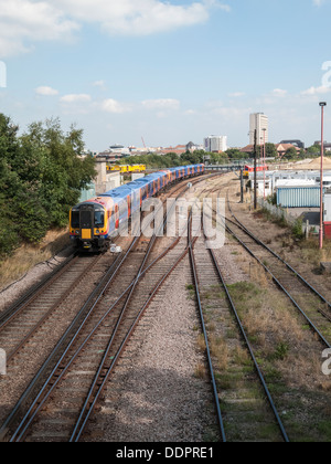 Railway tracks leading towards Woking, Surrey, England with South West ...