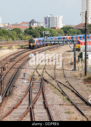 Railway tracks leading towards Woking, Surrey, England with South West ...