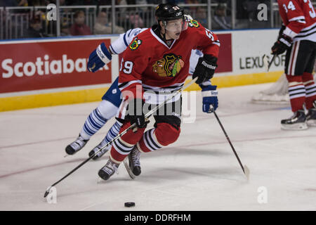 Toronto Maple Leafs Jamie Devane (59) is congratulated by teammate Brad ...