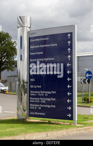 Sign at the entrance to Silverstone Racing Circuit with flags of the ...