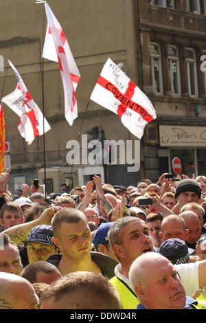 London, UK. 7 September 2013. A EDL member with a union jack flag at ...