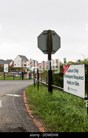 Labour required sign on house building site Stock Photo - Alamy