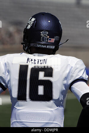 Utah State quarterback Chuckie Keeton dives into the end zone for a ...