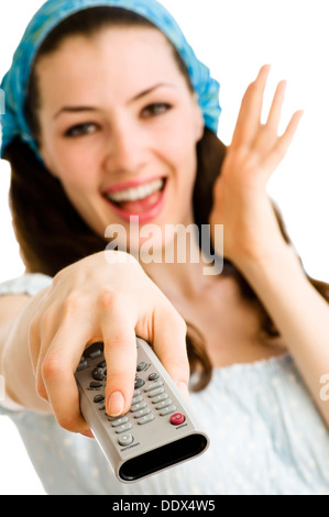 The woman with a television control panel. Selective focus Stock Photo ...