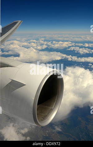 Airplane engine in mid air Stock Photo - Alamy
