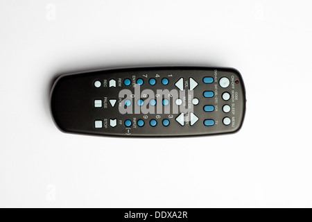 Black generic tv remote control in hand isolated on white studio ...