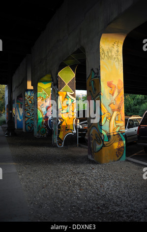 Graffiti under a overpass Stock Photo - Alamy