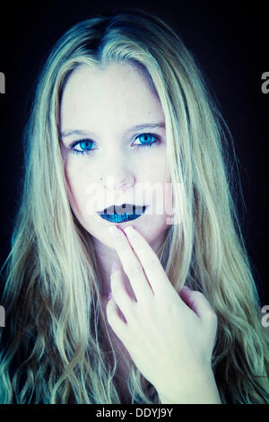 Woman, gothic look, thoughtful, looking away Stock Photo - Alamy