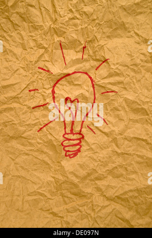 Light bulb with drawing on yellow background. Business idea concept ...