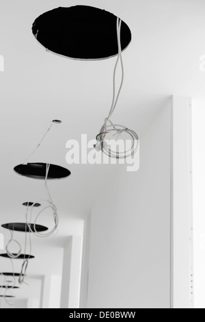 Cables hanging from the ceiling Stock Photo - Alamy