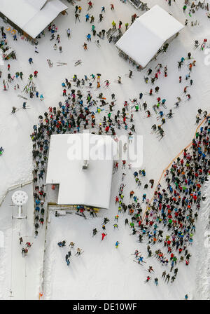 Skiers queueing for the ski lifts in Zermatt Switzerland Europe ...