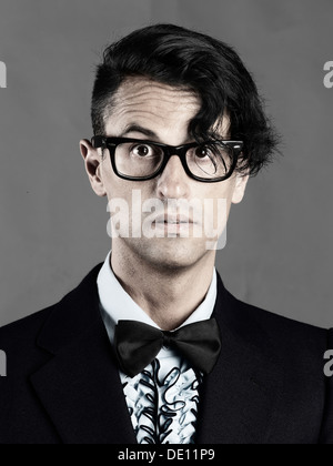Portrait of a silly guy looking weird Stock Photo - Alamy